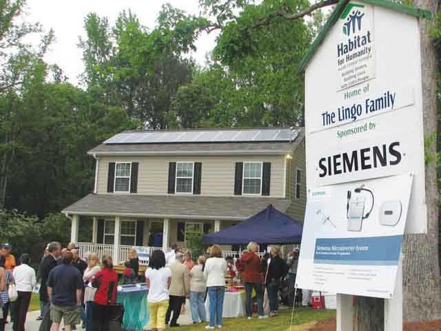 Family moves into first solar home - Forsyth News