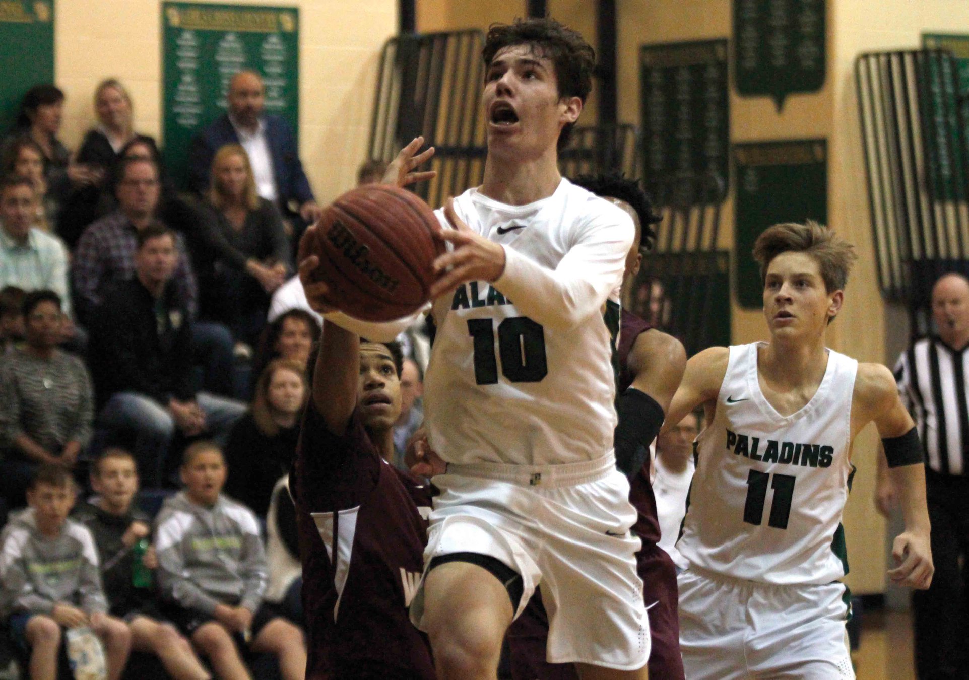 Basketball: Pinecrest boys outmuscled in region loss to Walker ...
