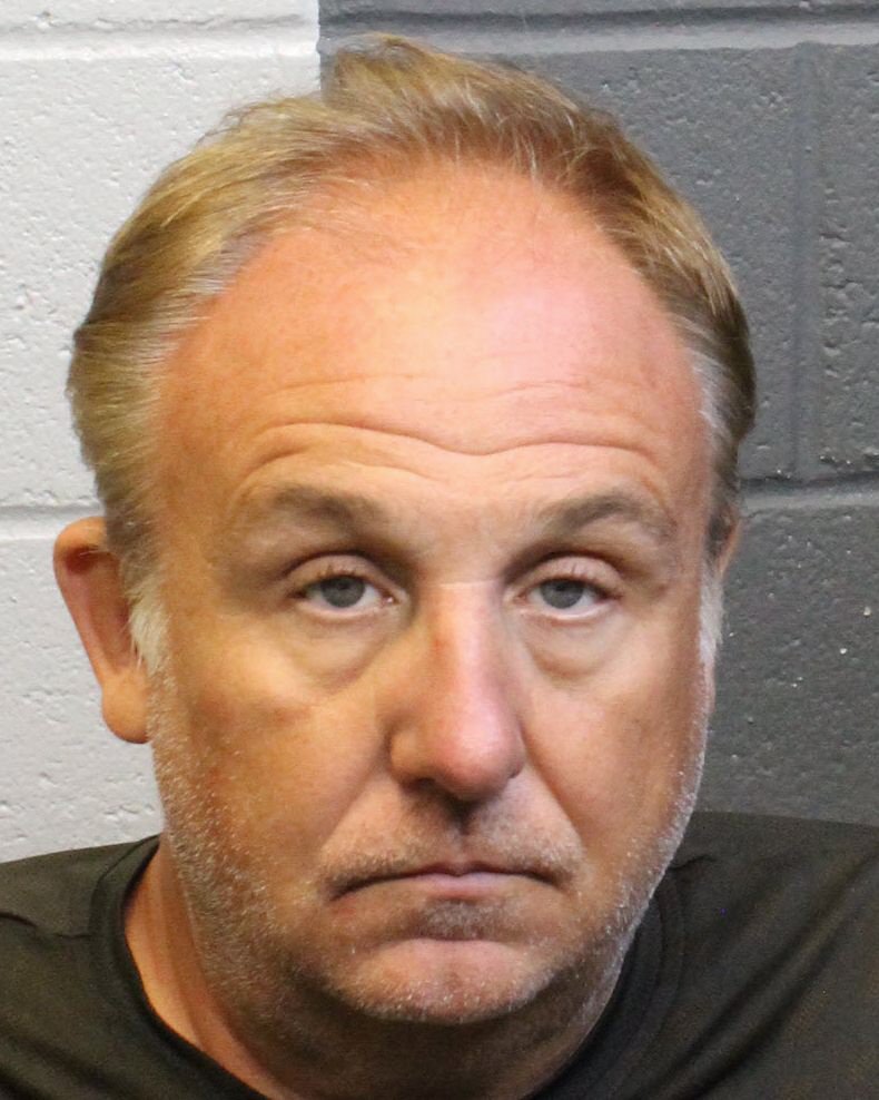 Authorities: Former manager hid in Cumming movie theater, climbed ...