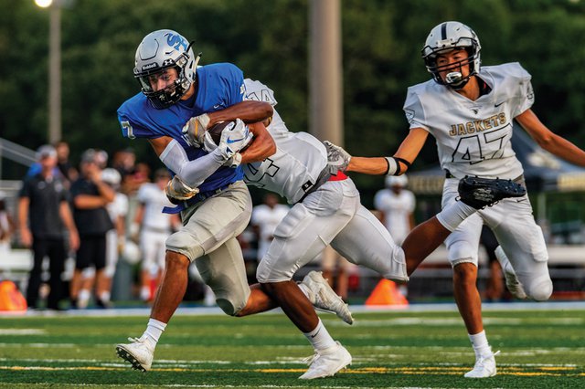 Football: Green's four touchdowns lead South past Sprayberry - Forsyth News