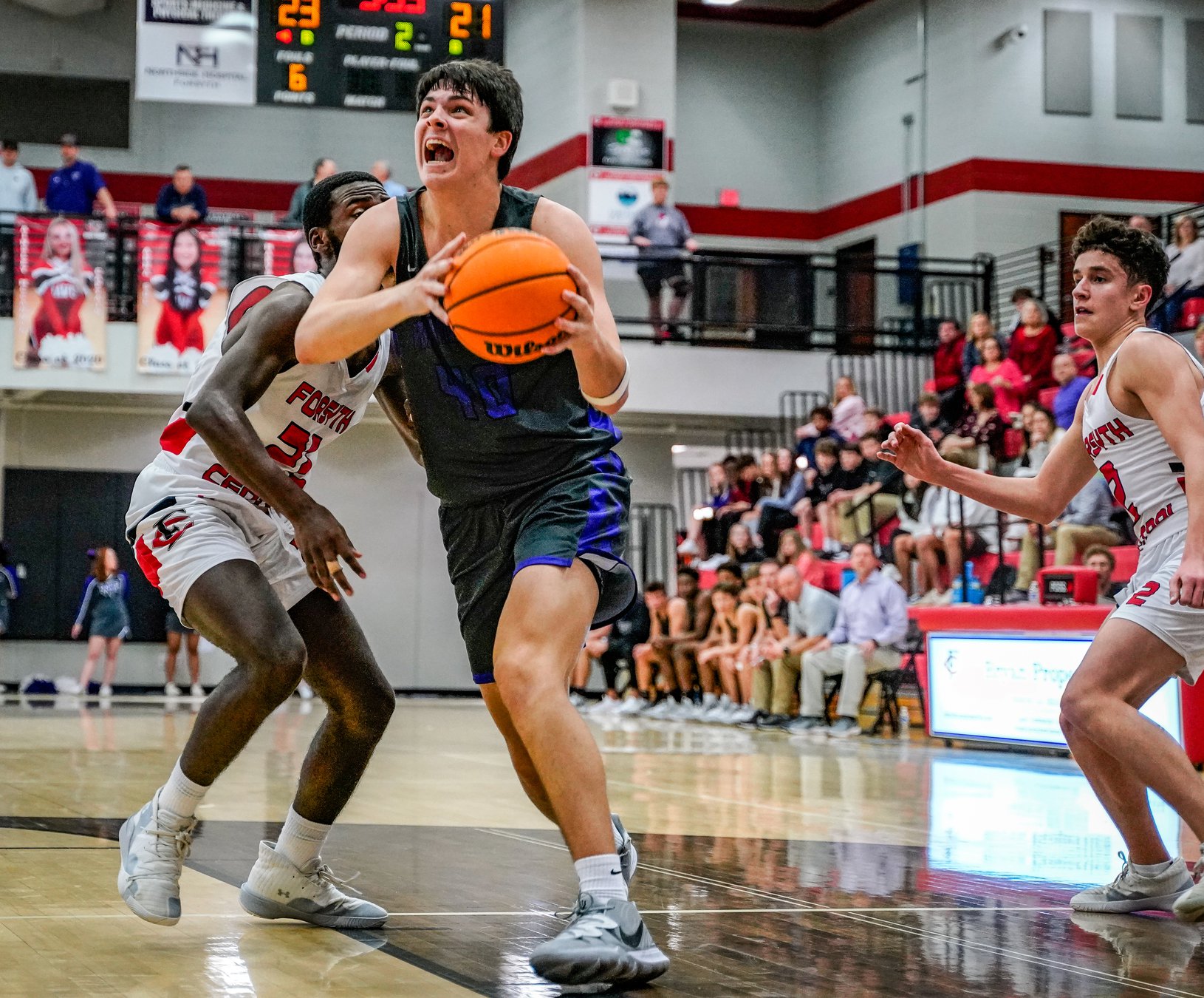 Basketball: North Forsyth holds off Central, rallies for first region ...