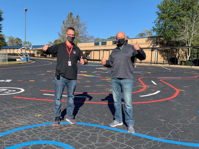 How Sawnee Elementary turned its plain bus lanes into a colorful ...