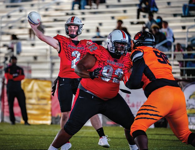 PHOTOS: Peach State Cats open season with 42-26 win - Forsyth News