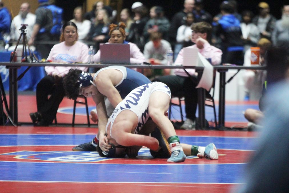Wrestling Roundup: 3 Forsyth grapplers capture state titles; Wolverines ...