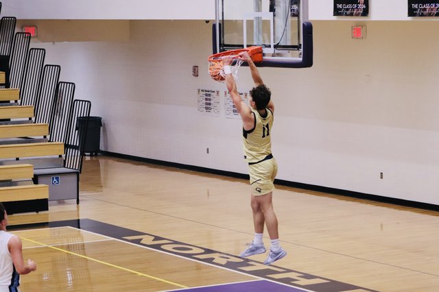 Basketball: Wolverines edge Greyhounds to capture Raider Classic title ...