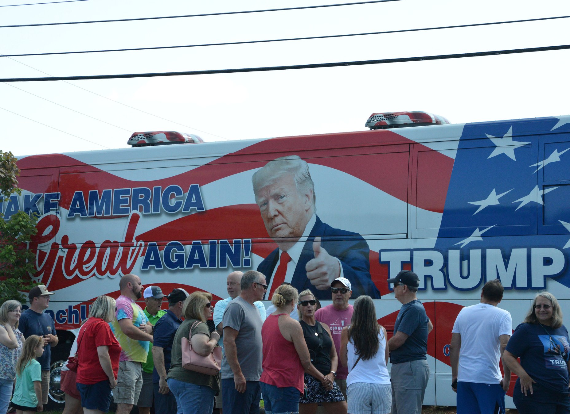 ‘This [bus] is like a magnet,’ Hundreds turn out when the Trump Bus ...