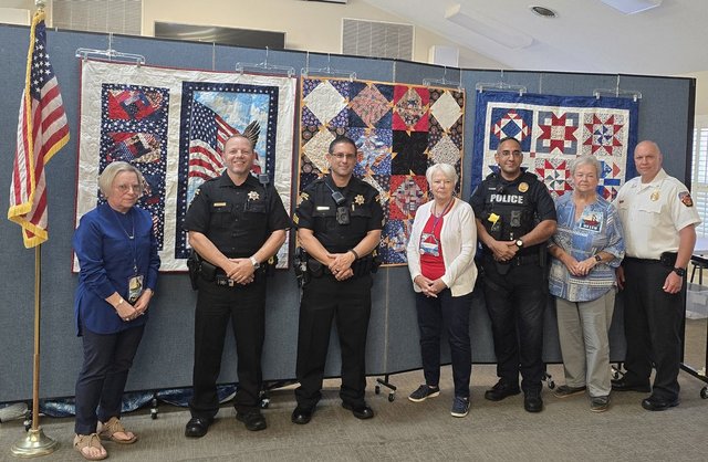 Local group knits quilts to thank first responders - Forsyth News