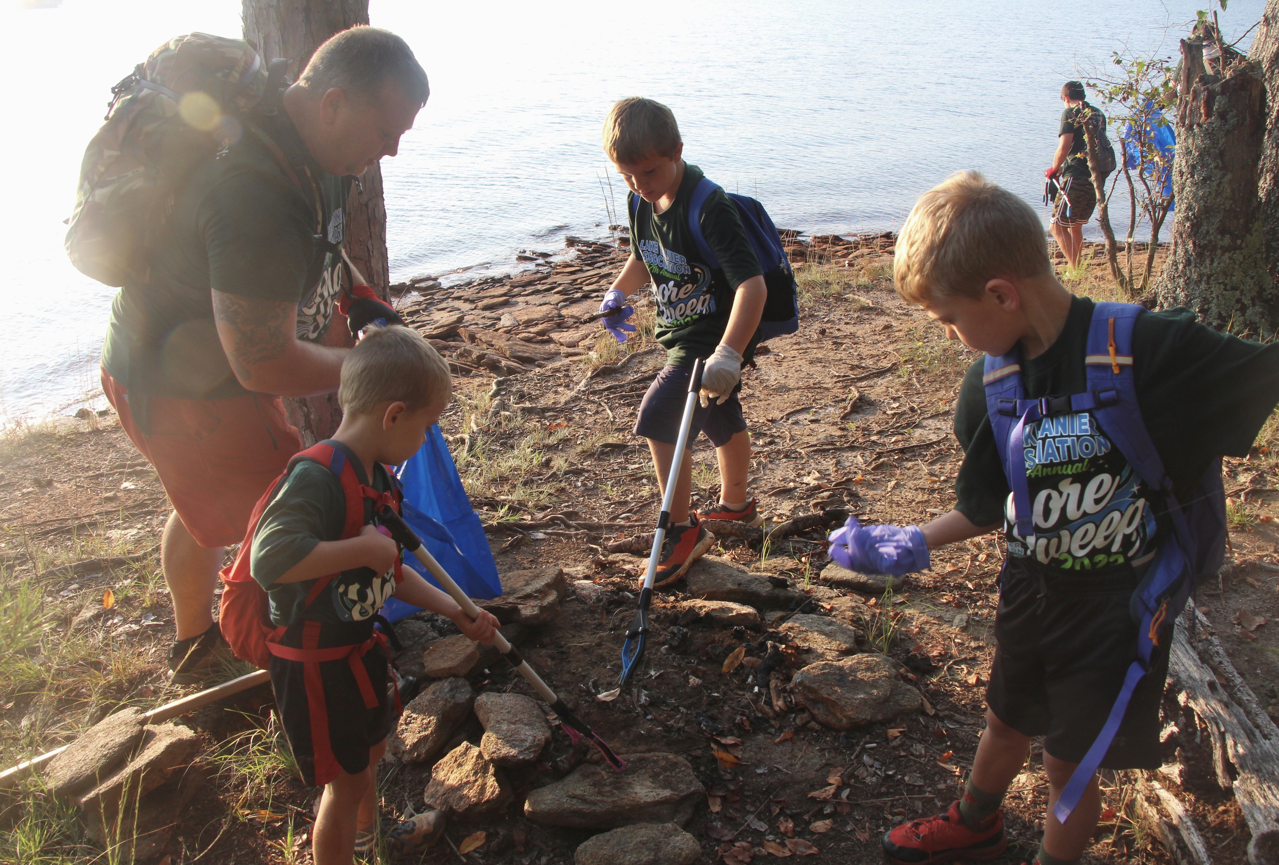 Volunteers take to land and lake for 2025 Shore Sweep | Lake Lanier ...