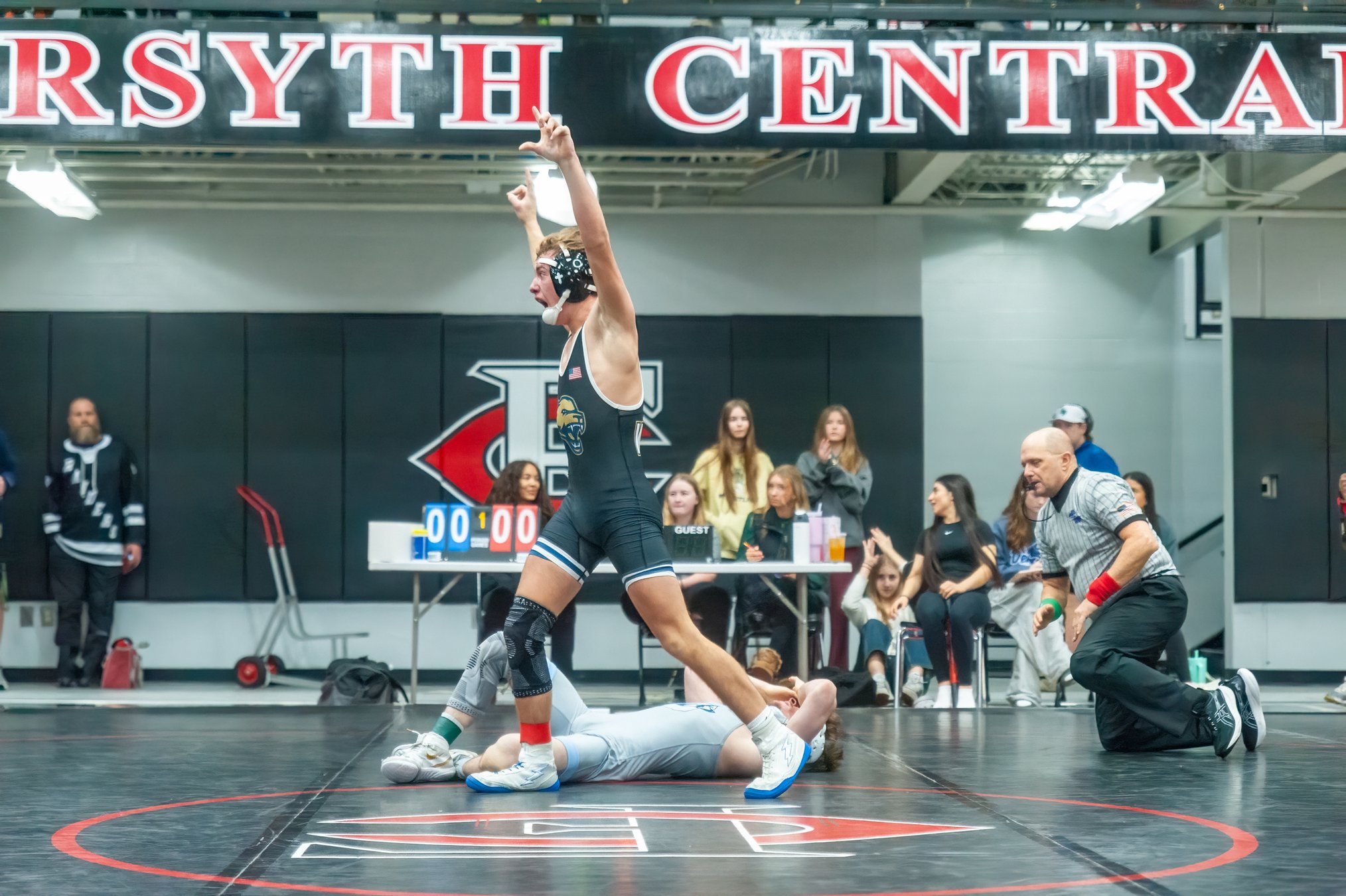 Wrestling: Wolverines continue region reign with 7th duals title since ...