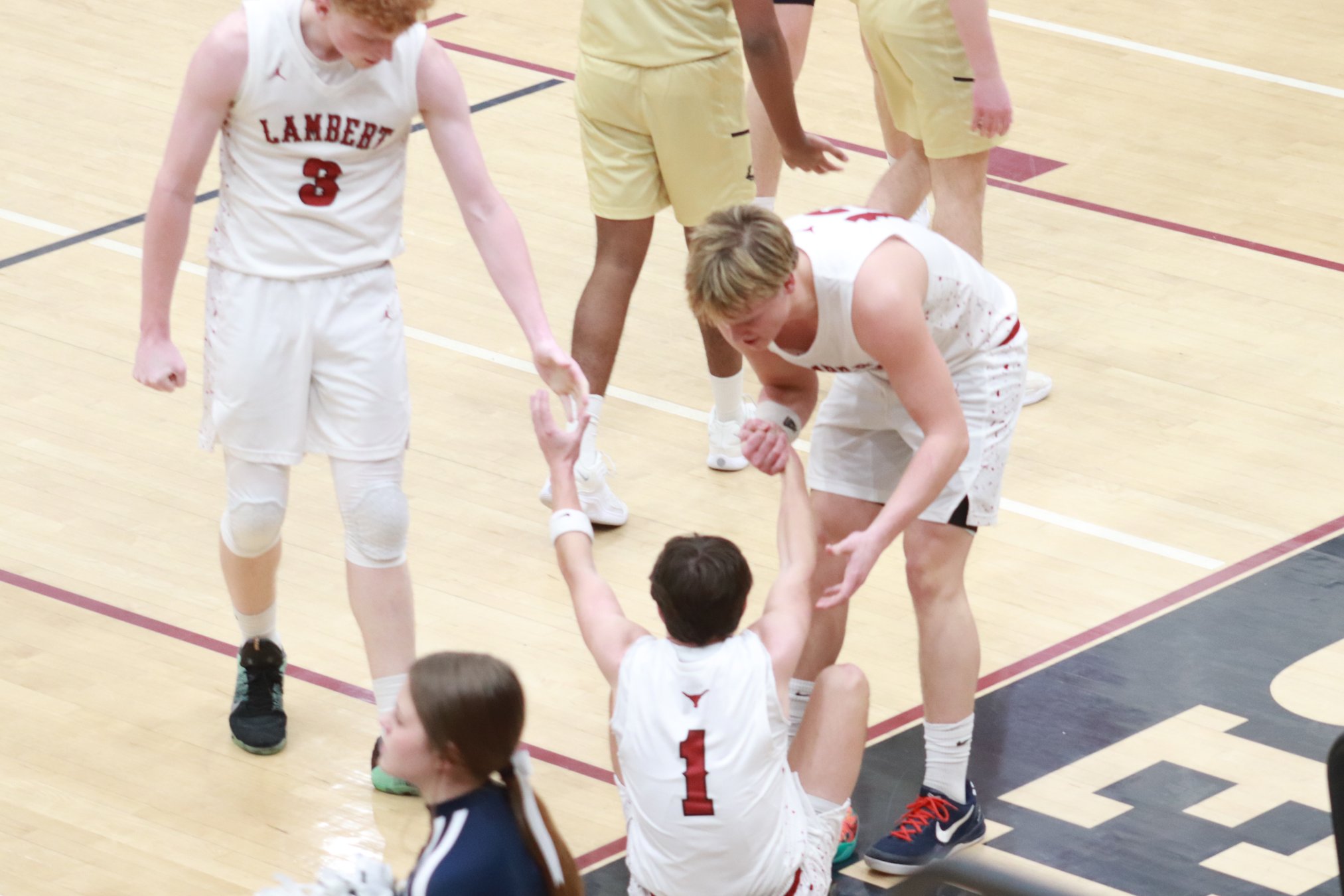 Basketball: Longhorns dominate Wolverines in penultimate region game ...