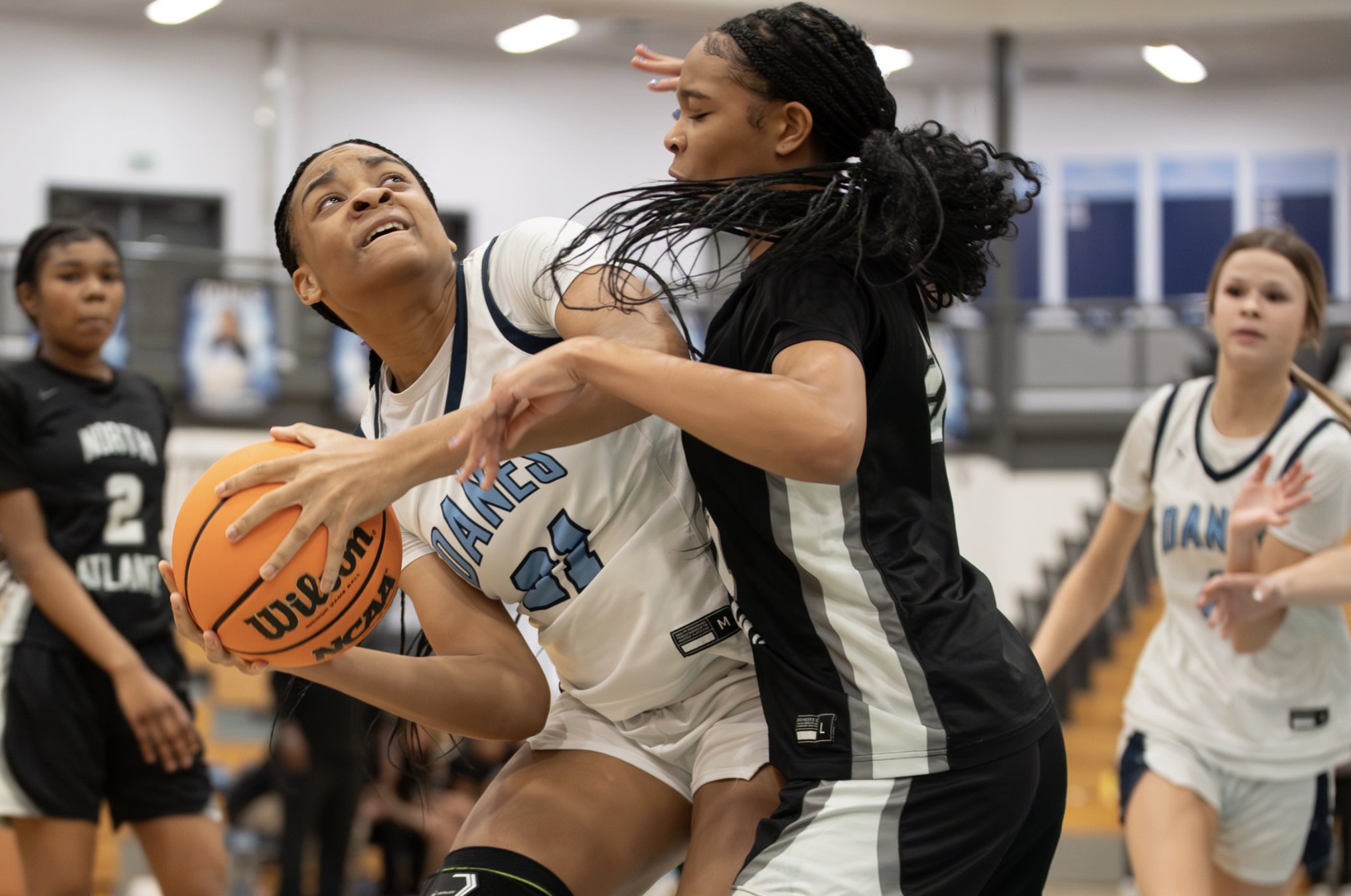 Basketball: Denmark swept on senior night - Forsyth News