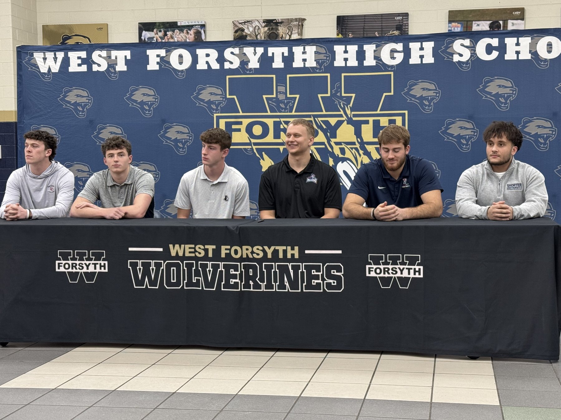 Signing Day: Wolverines heading to play college football - Forsyth News